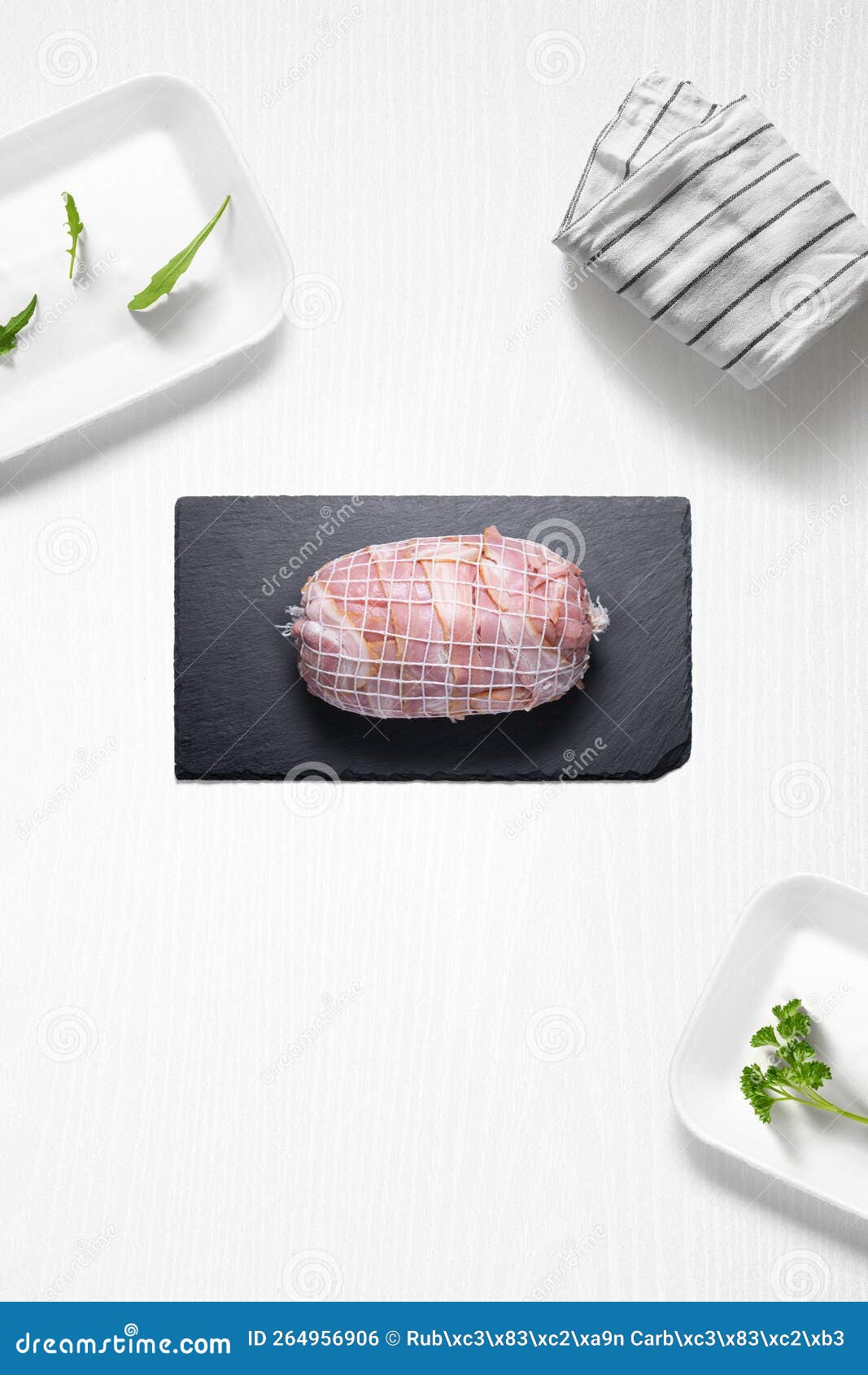 Beef Roti with Bacon on a Kitchen with Some Herbs Stock Photo - Image ...
