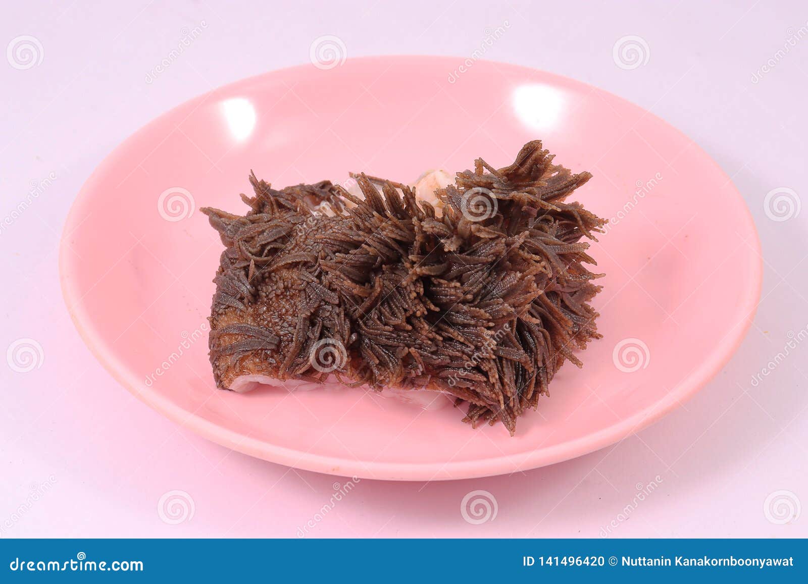 Beef rumen on pink dish stock photo. Image of ingredient - 141496420
