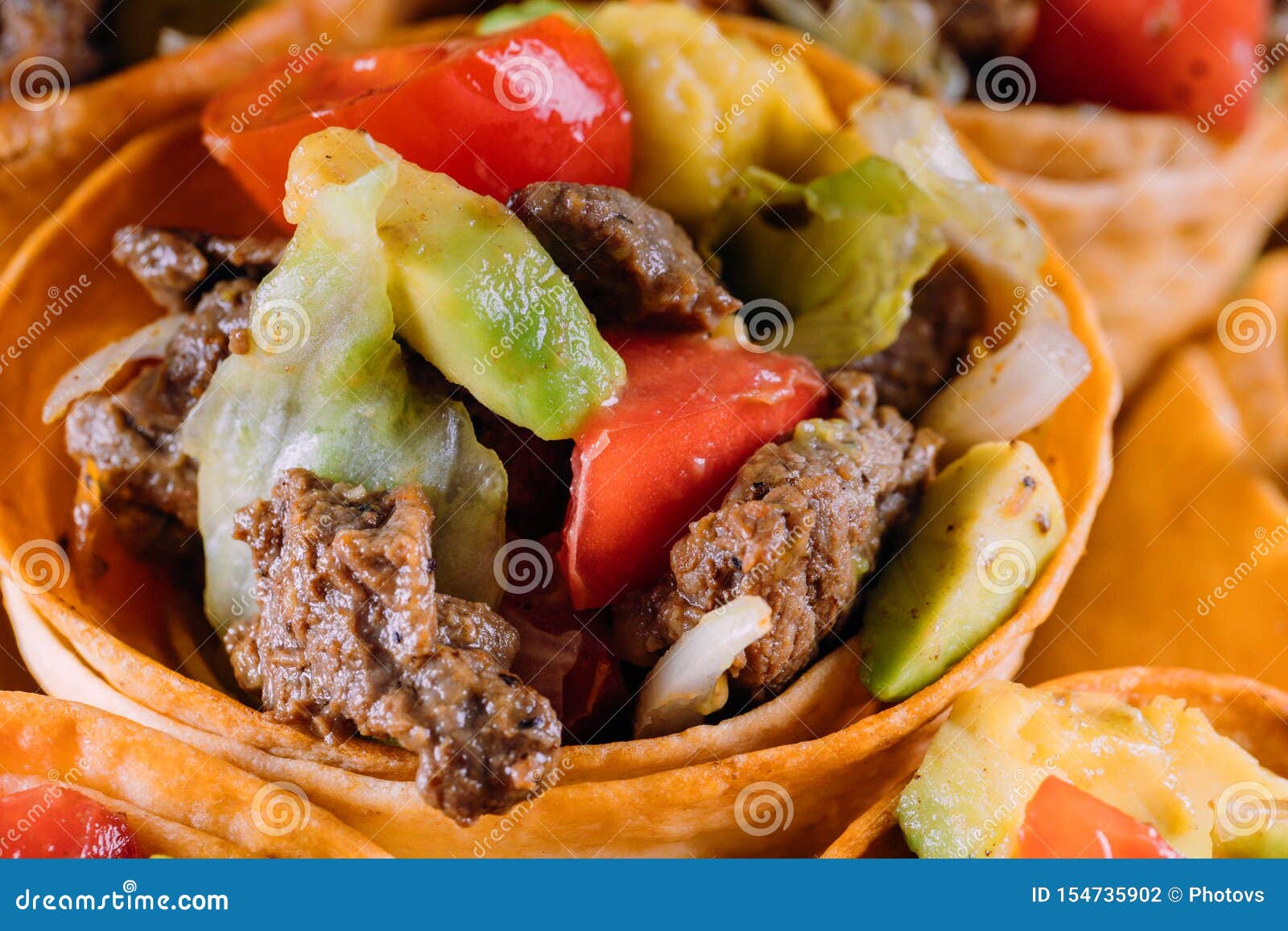 Beef Salad in Taco Cones with Pepper and Avocado Stock Photo - Image of ...