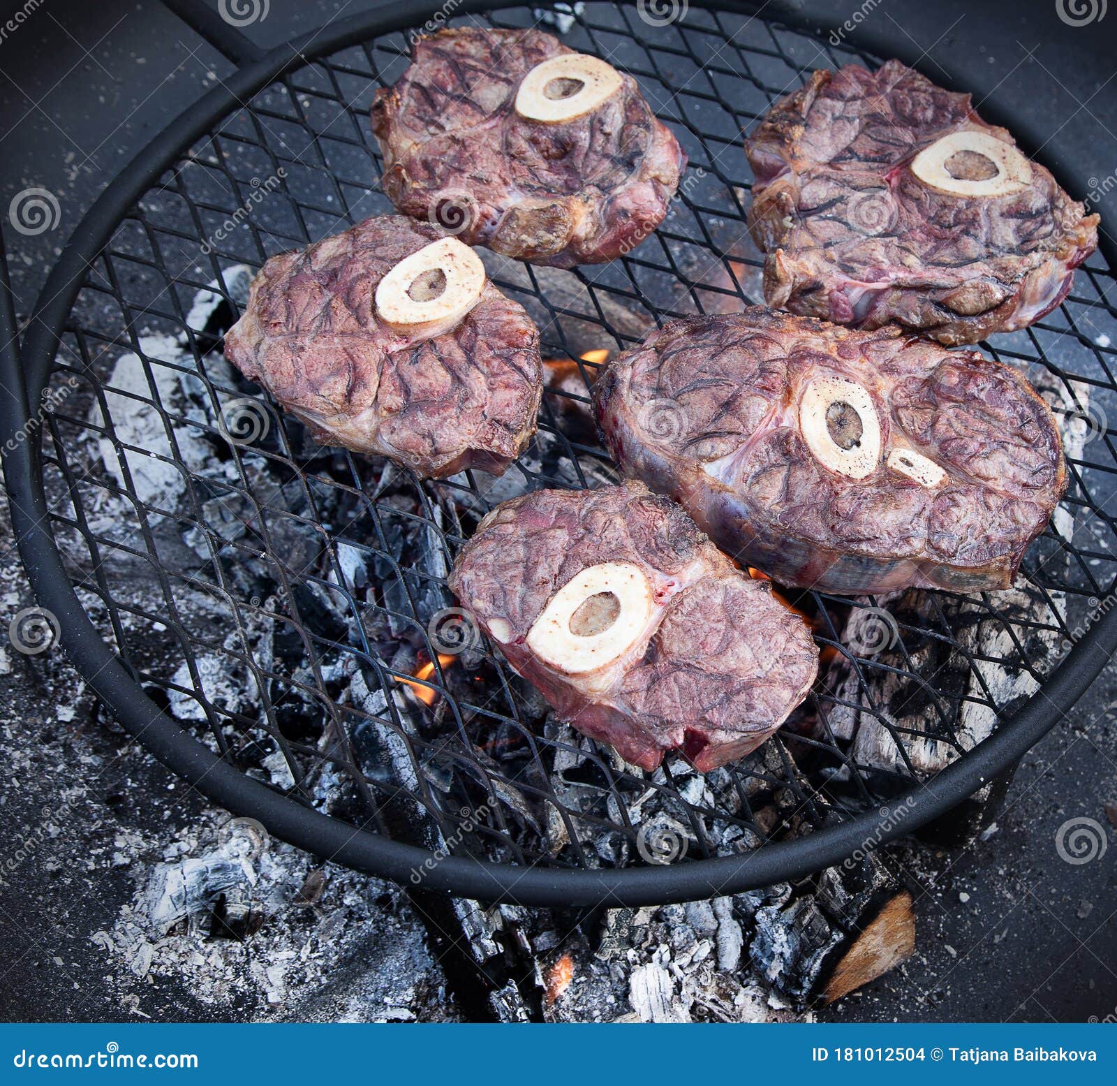 Beef Shanks on a Barbecue Grill Over Coals Stock Photo - Image of shank ...