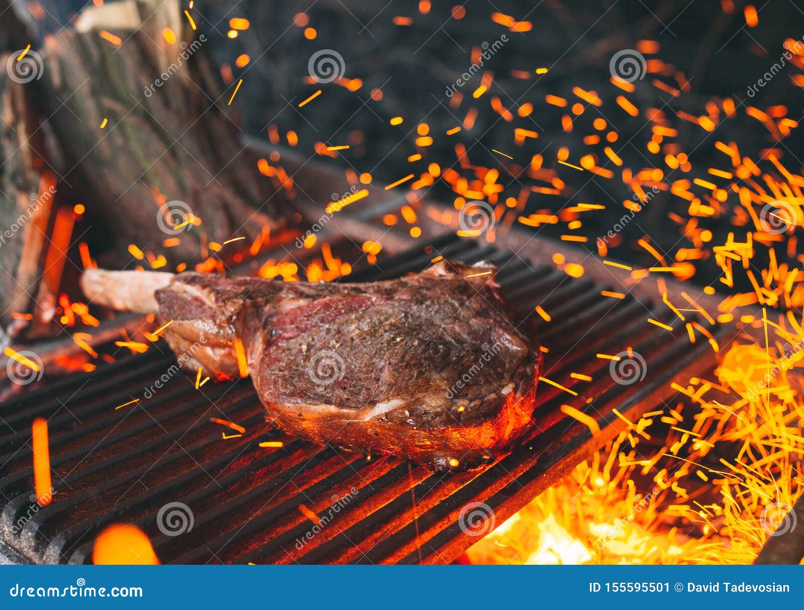 Beef Steak is Cooked on Fire. Beef Rib BBQ . Stock Image - Image of ...