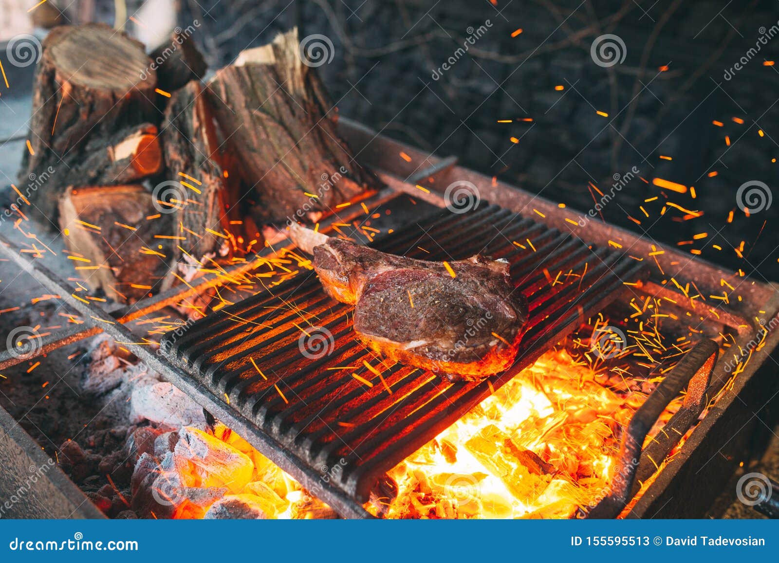 Beef Steak is Cooked on Fire. Beef Rib BBQ . Stock Image - Image of ...