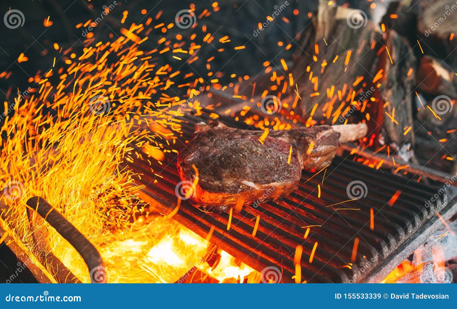 Beef Steak is Cooked on Fire. Beef Rib BBQ . Stock Image - Image of ...
