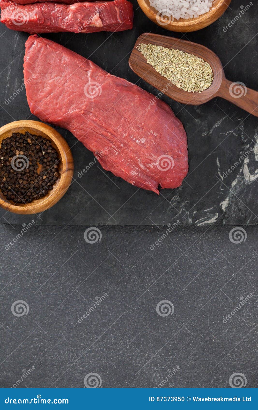 Beef Steak, Salt and Spices on Black Slate Plate Stock Photo - Image of ...