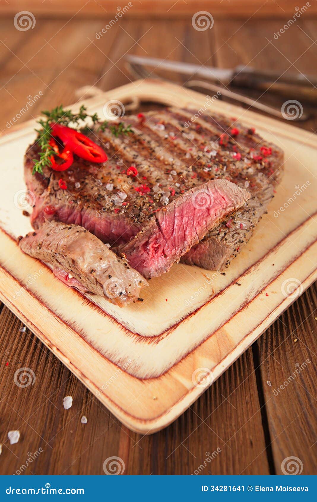 Beef Steak on a Wooden Board and Table Stock Image - Image of ...