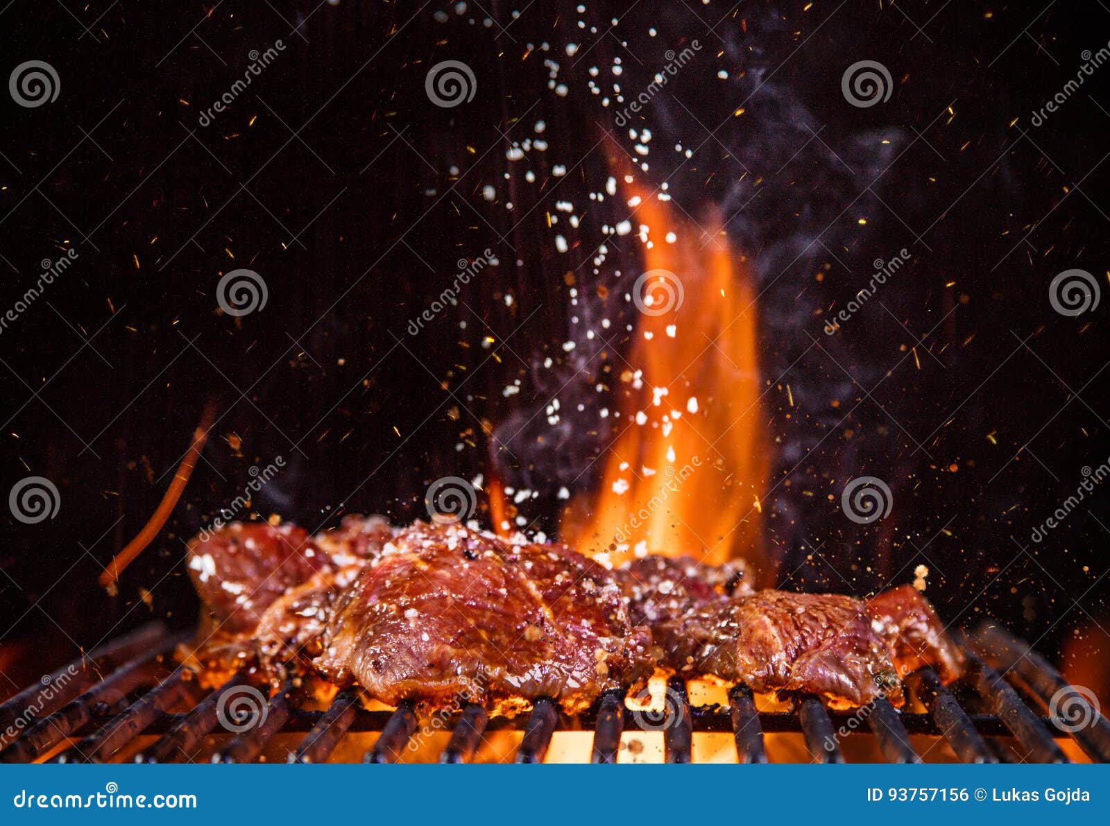 Beef Steaks on the Grill with Flames Stock Photo - Image of grid ...