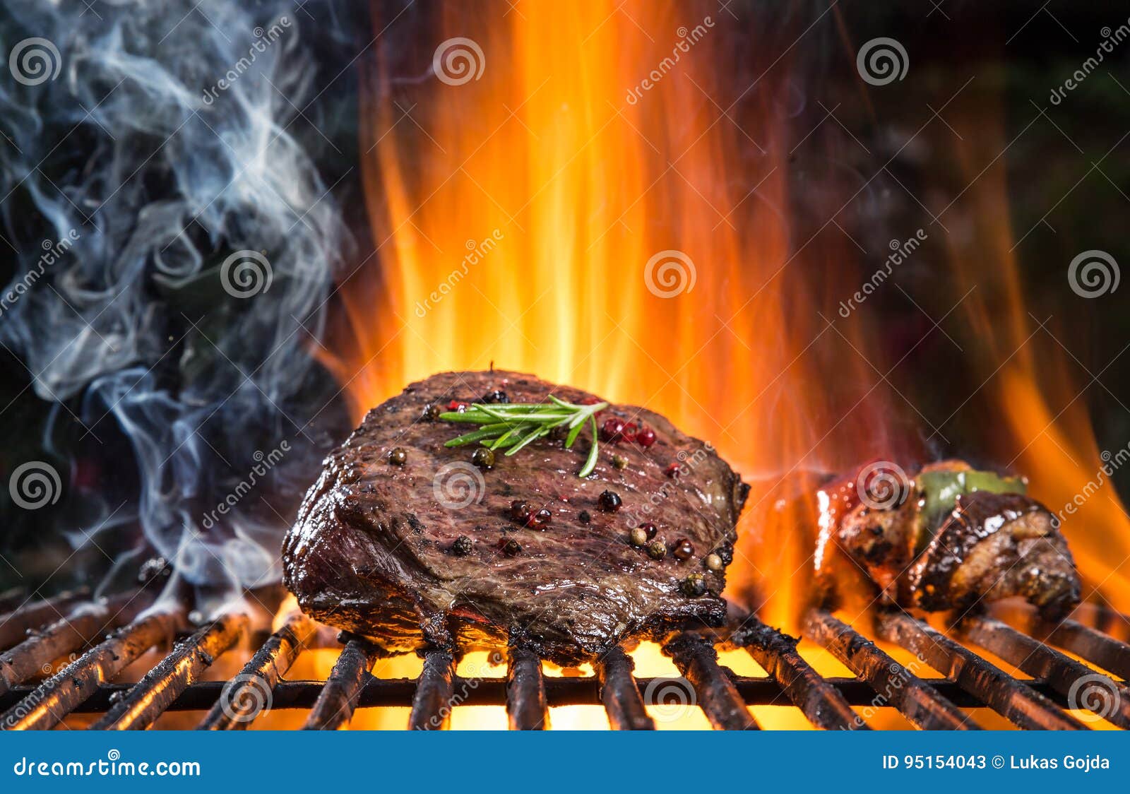 Beef Steaks on the Grill with Flames Stock Image - Image of fire ...