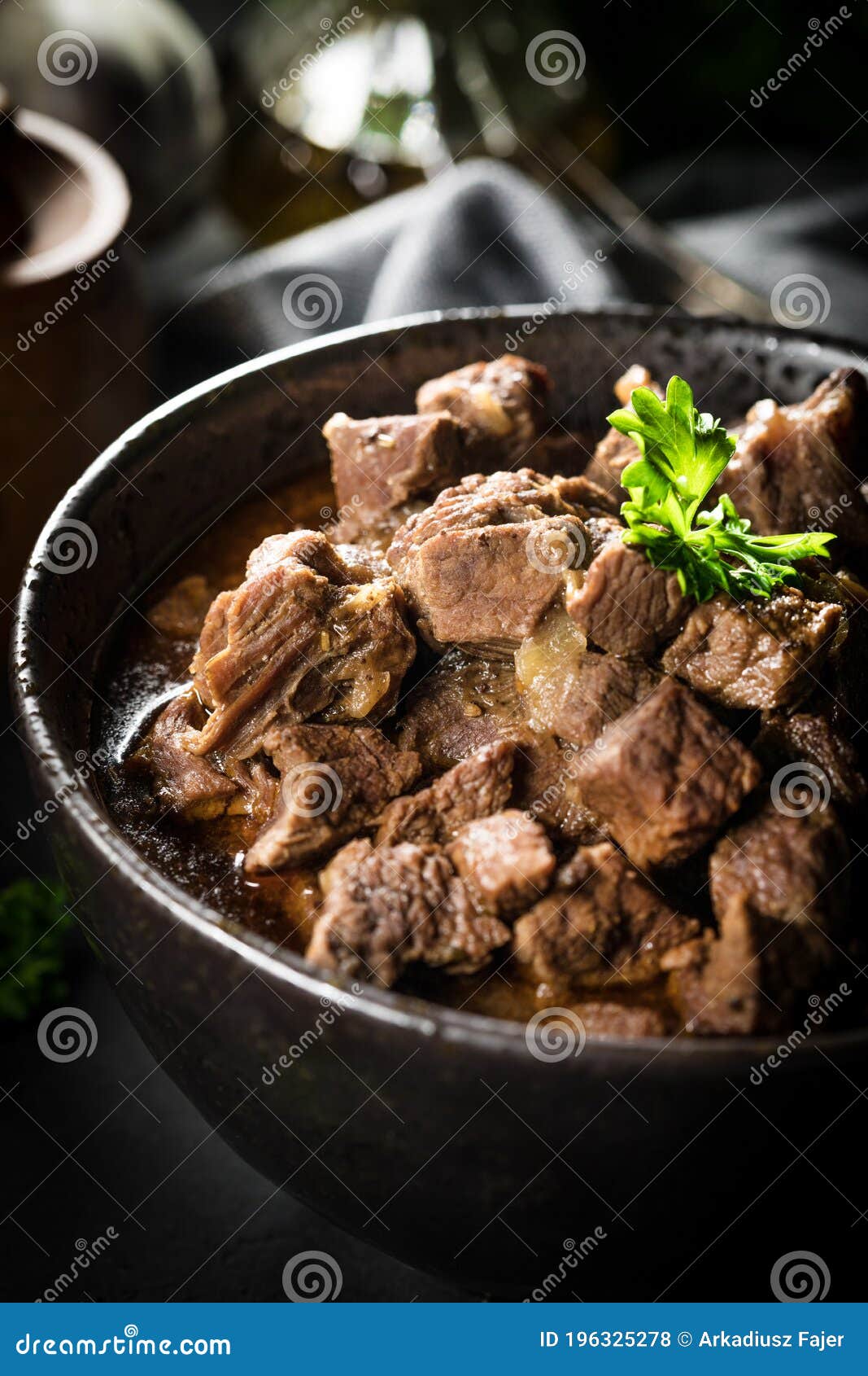 Beef stew in a bowl stock photo. Image of wooden, fresh - 196325278