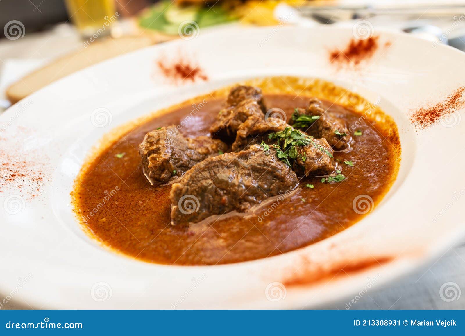 Beef Stew with Large Chunks of Meat Served in a White Plate Stock Image ...