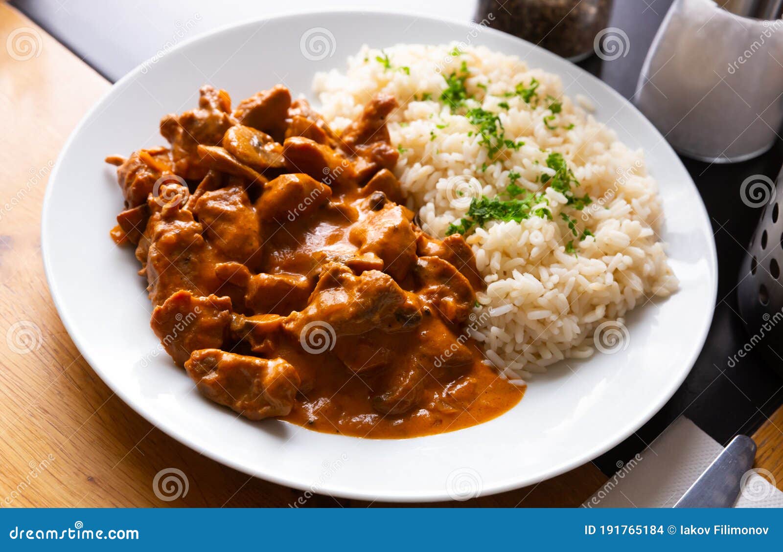 Beef stroganoff with rice stock photo. Image of knife - 191765184