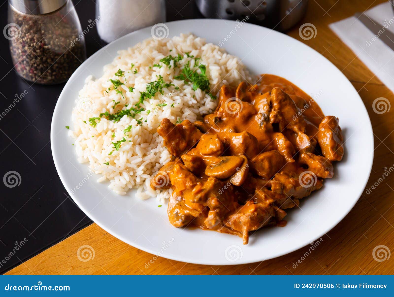 Beef stroganoff with rice stock photo. Image of sauce - 242970506