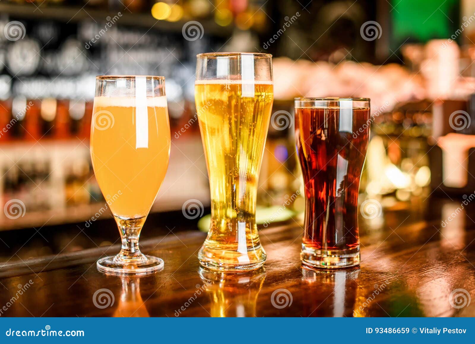 The beer assortment in pub stock image. Image of counter - 93486659