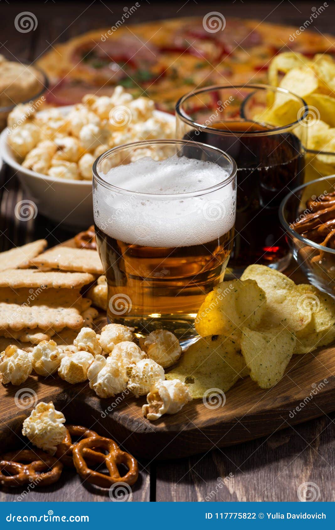 Beer and an Assortment of Snacks, Vertical Stock Photo - Image of ...