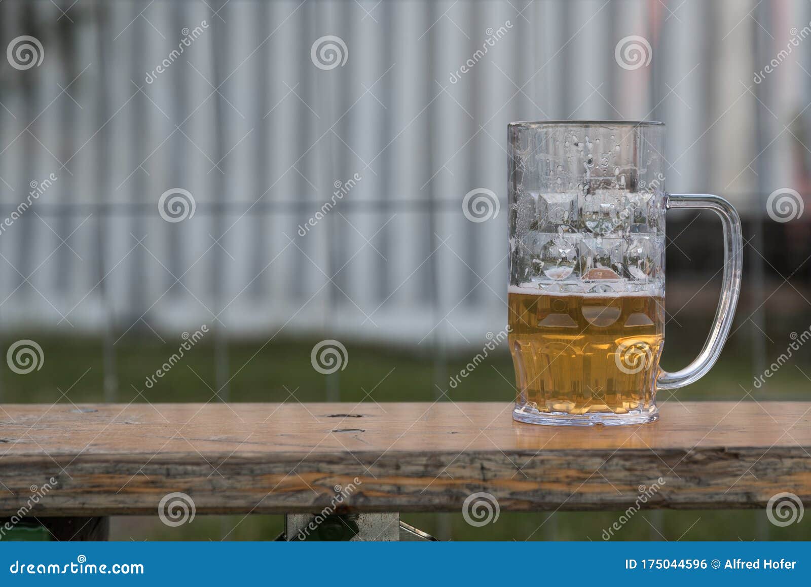 Mug Of Beer On A Bench Stock Photo | CartoonDealer.com #69770538