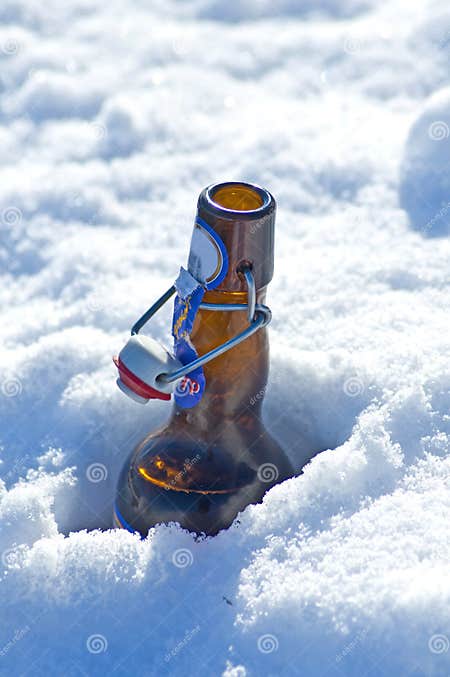 Beer bottle in snow stock photo. Image of beer, beverage - 29165128