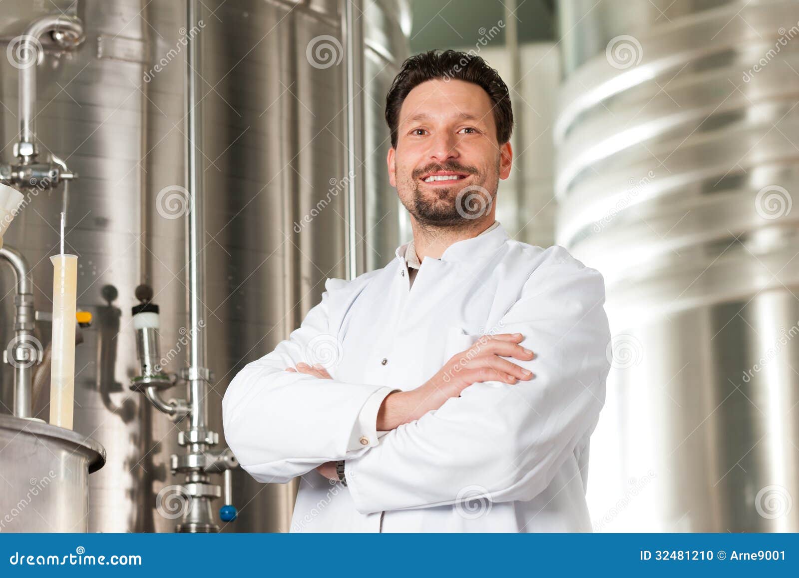 Beer brewer in his brewery stock photo. Image of profession - 32481210