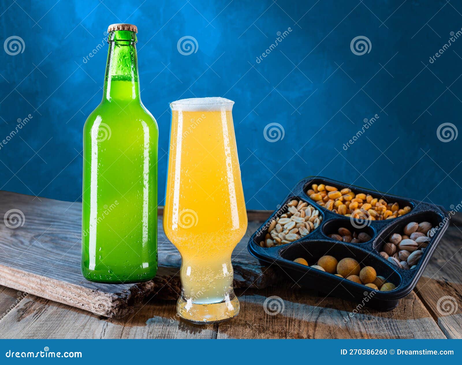Beer Composition. Beer and Snacks. Bottle and Glass of Light Beer. Beer ...