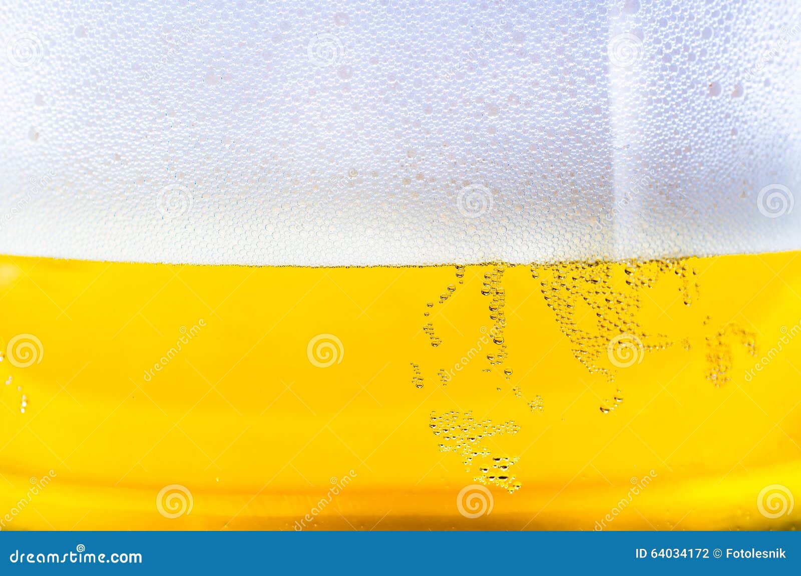 Beer in a glass background stock photo. Image of droplets - 64034172