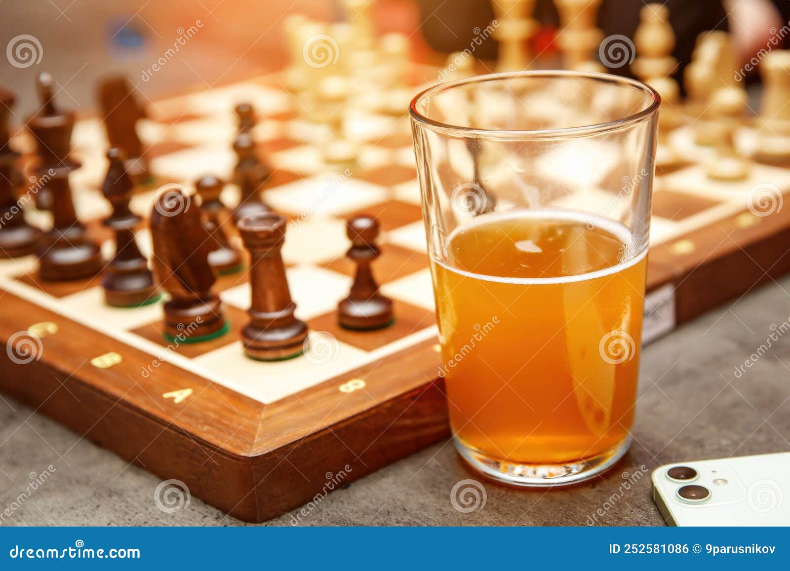 The Beer Glass and Chess Board in the Bar. Stock Photo - Image of party ...