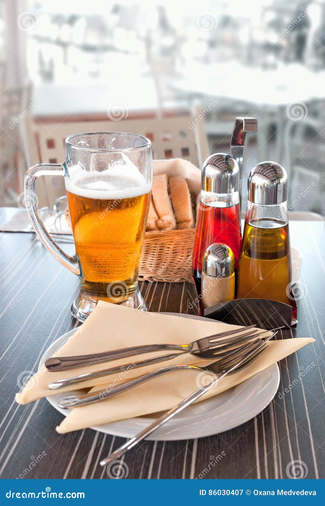 Beer in the Glass on the Table with Serving Stock Image - Image of ...