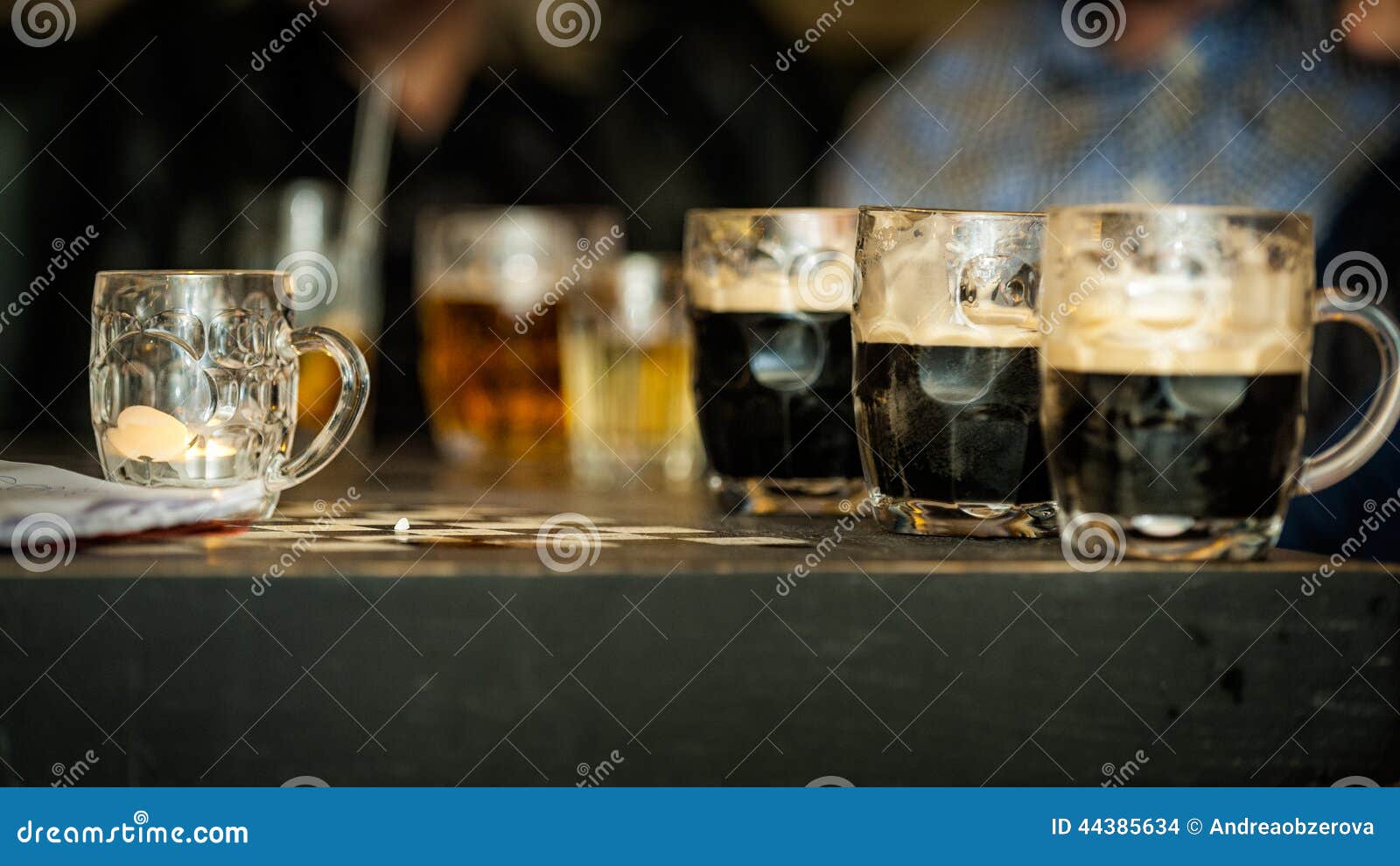 Beer Glasses on the Table of a Bar Stock Photo - Image of horizontal ...