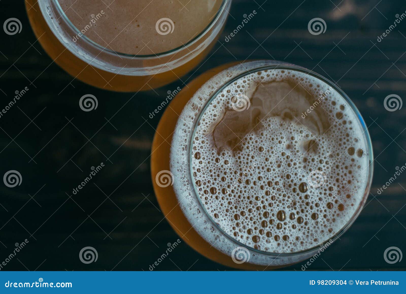 Beer glasses top view stock photo. Image of brewed, light - 98209304
