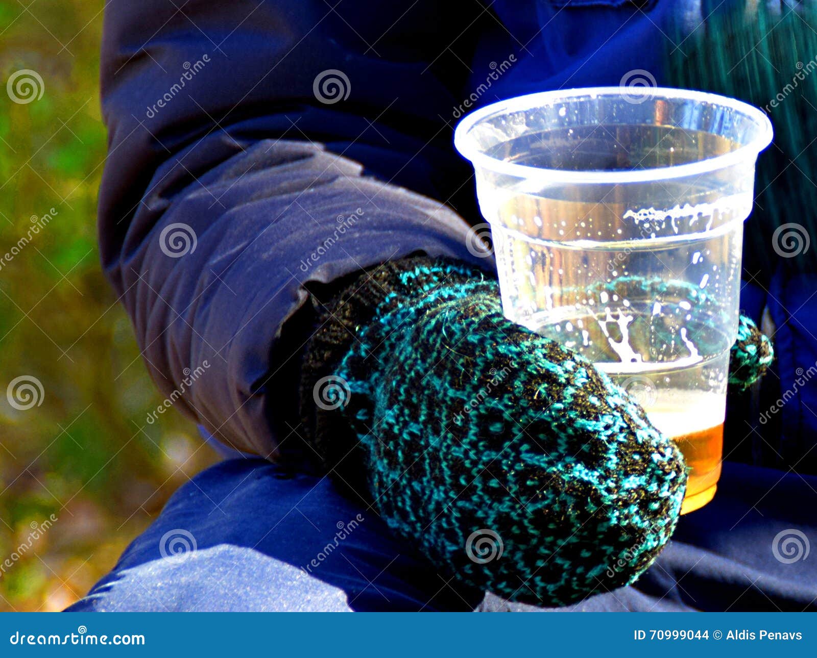 Beer in hand stock photo. Image of party, alcohol, gloves - 70999044
