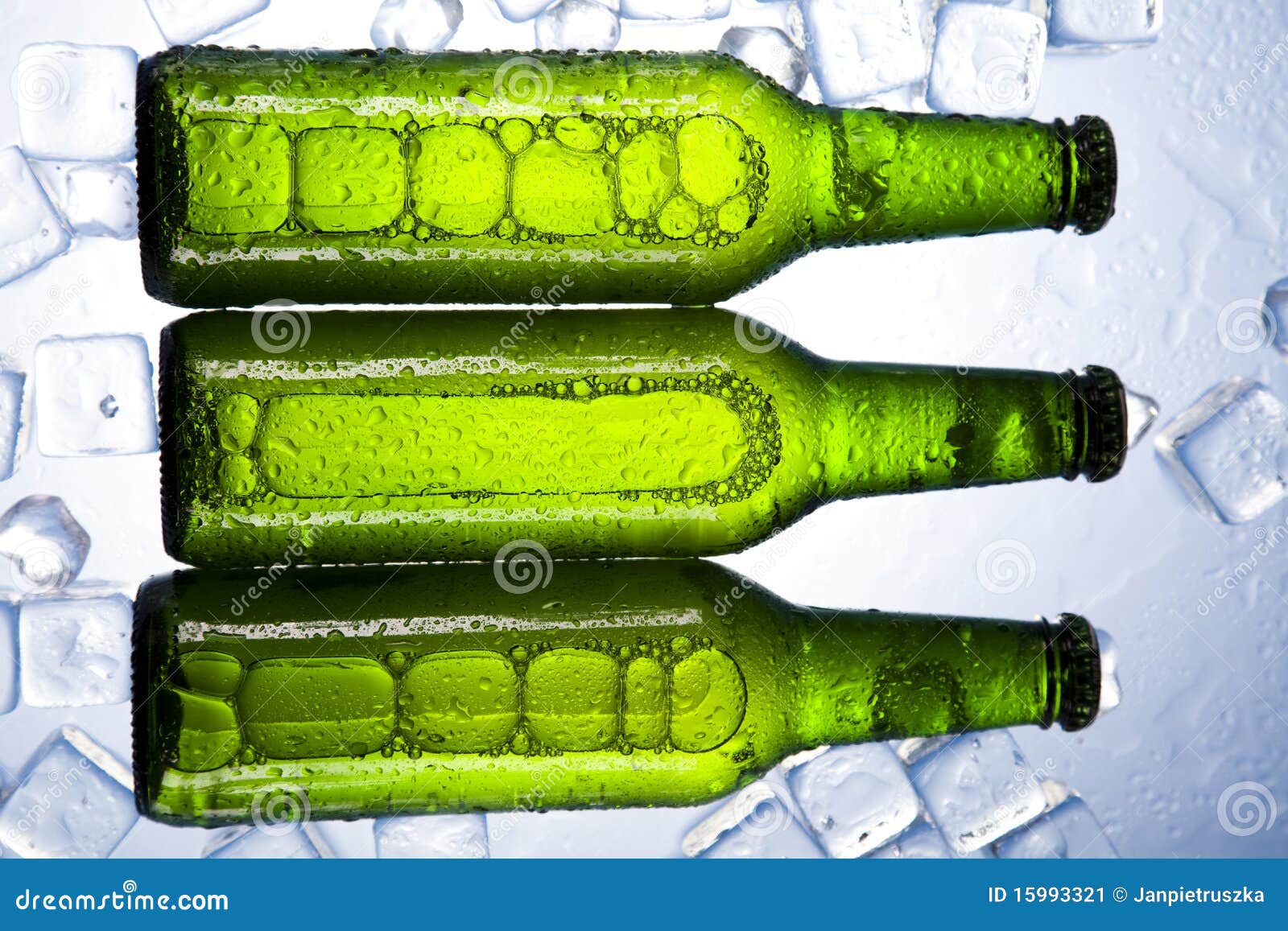Beer is in ice stock image. Image of alcohol, evening - 15993321