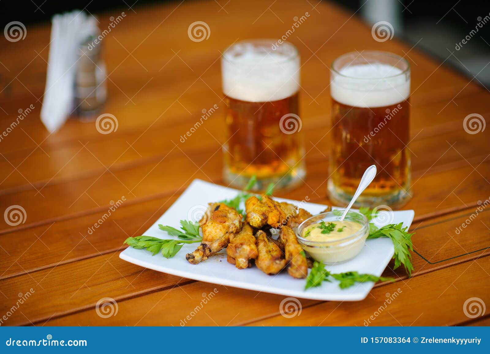Beer with Meal on the Table Stock Photo - Image of refreshment, lunch ...