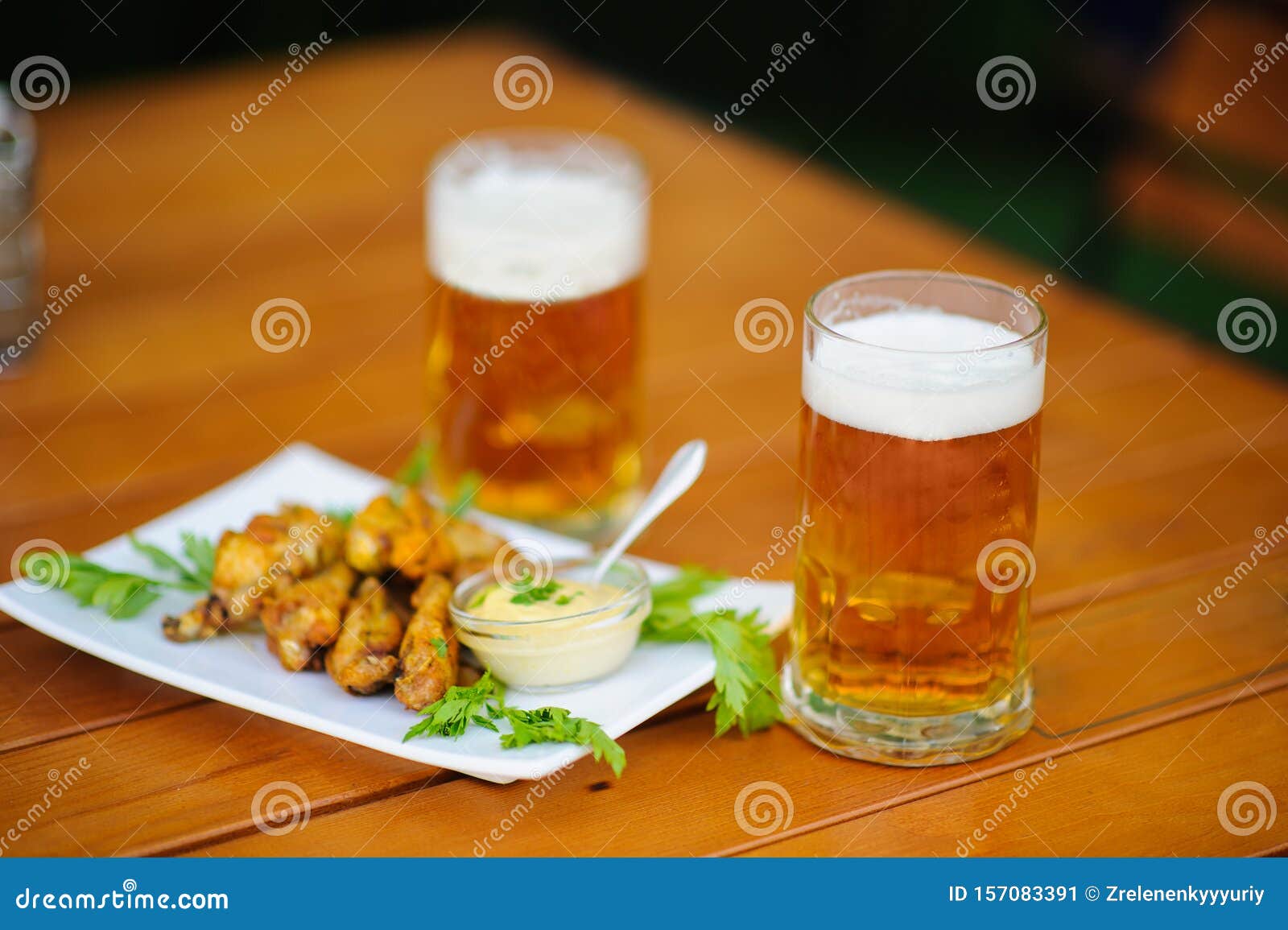 Beer with Meal on the Table Stock Image - Image of closeup, meat: 157083391