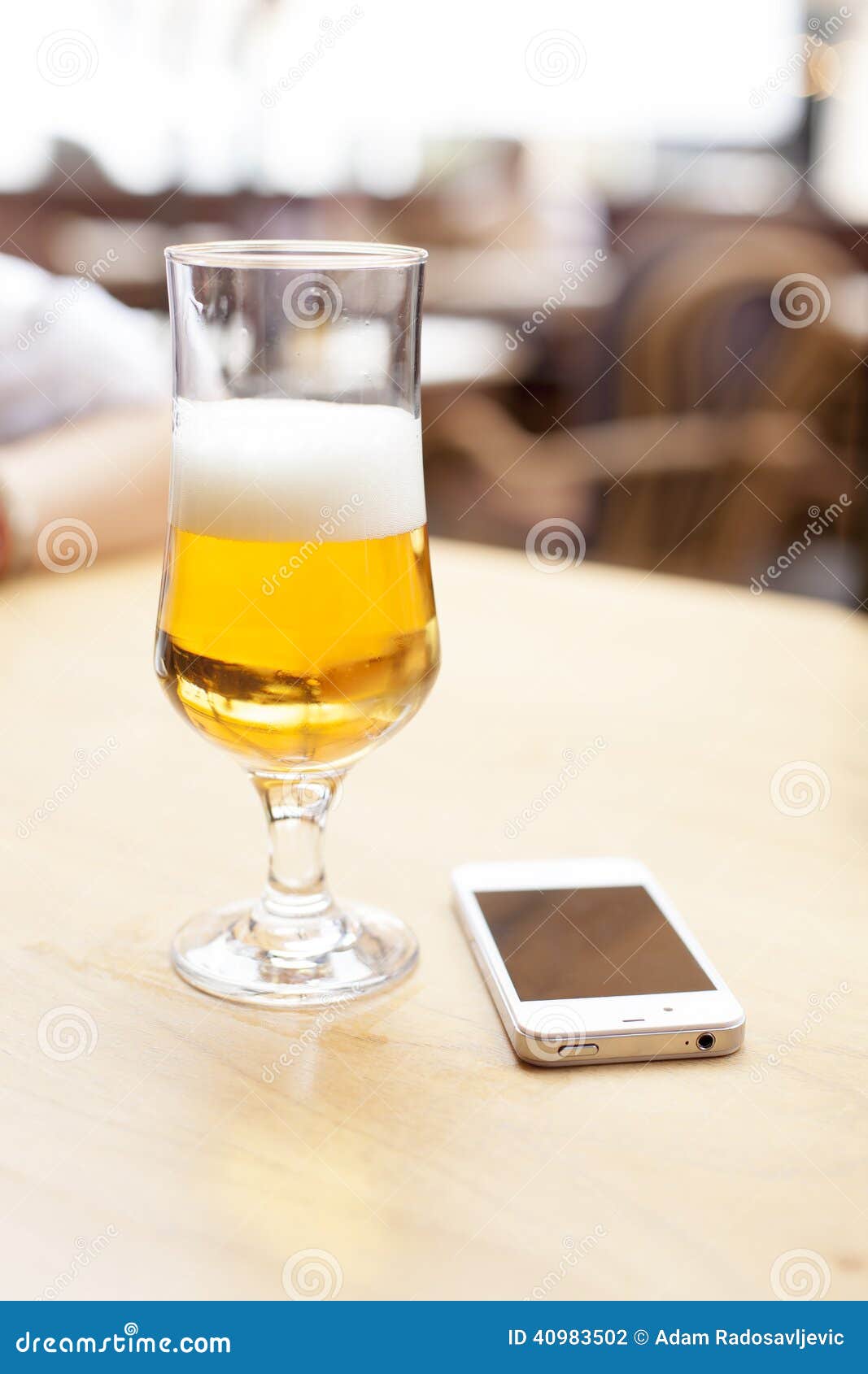 Beer and Mobile Phone on Table Stock Photo - Image of alcohol, phone ...