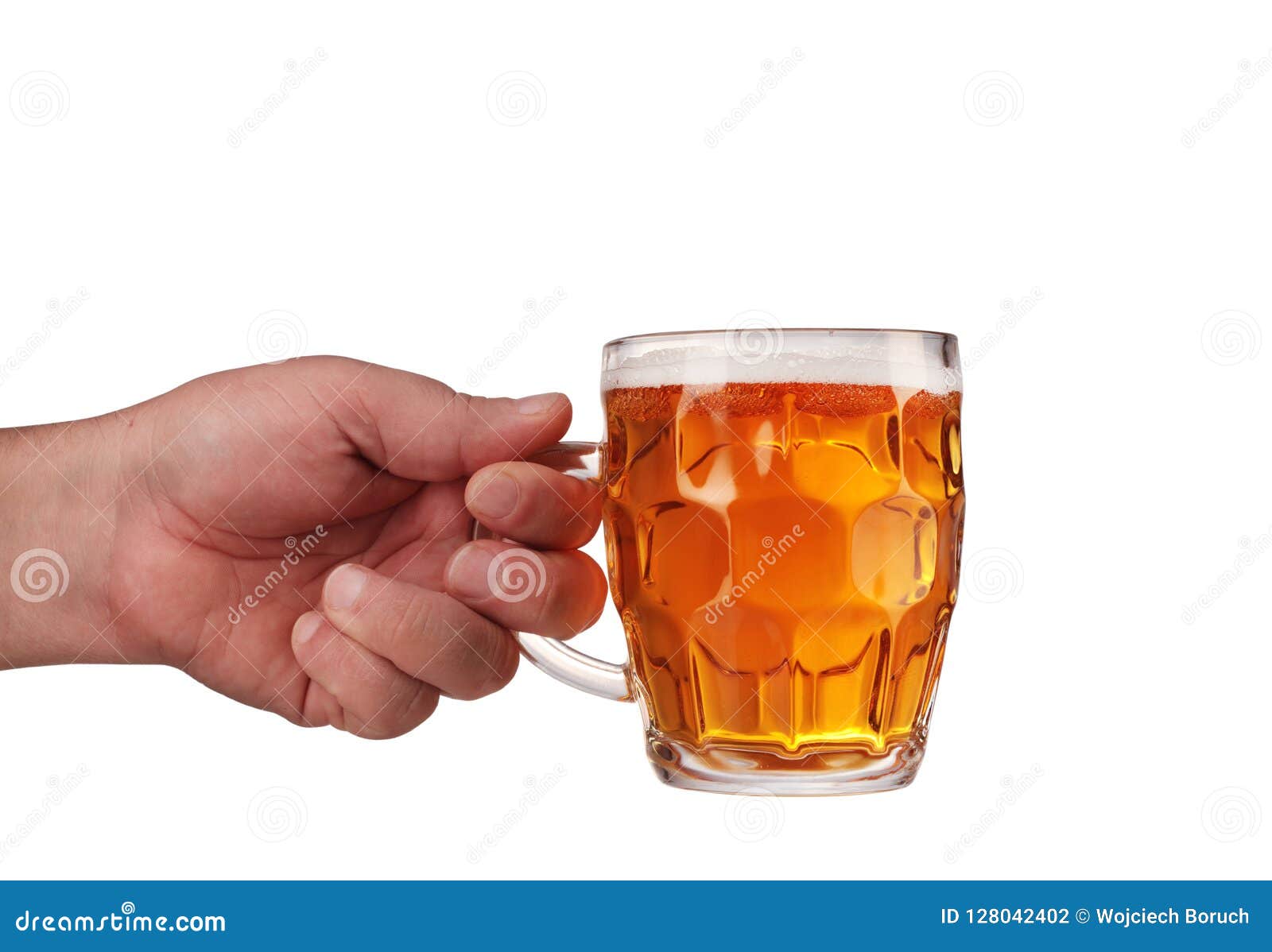 A beer mug in your hand stock photo. Image of yellow - 128042402