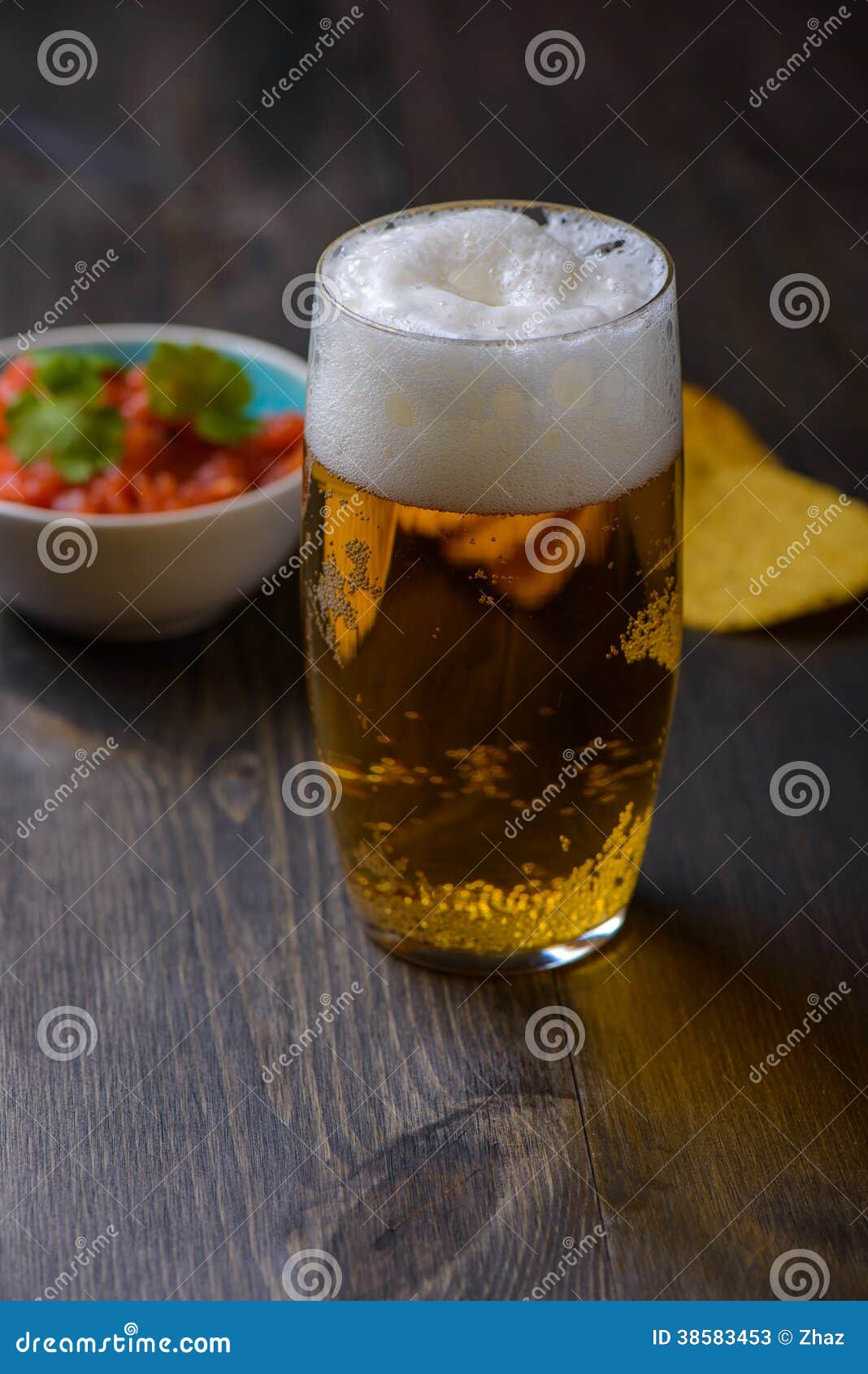 Beer with nachos and salsa stock image. Image of bowl - 38583453