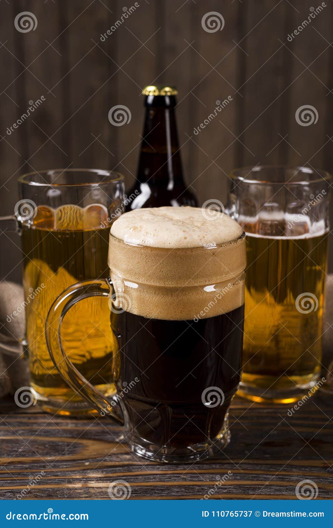 Beer on Wooden Table Rustic Stock Image - Image of frosty, fresh: 110765737