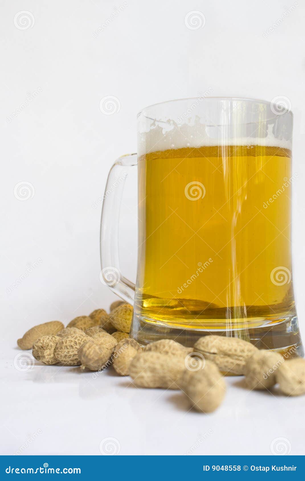 Beer & peanuts stock photo. Image of alcohol, liquid - 9048558