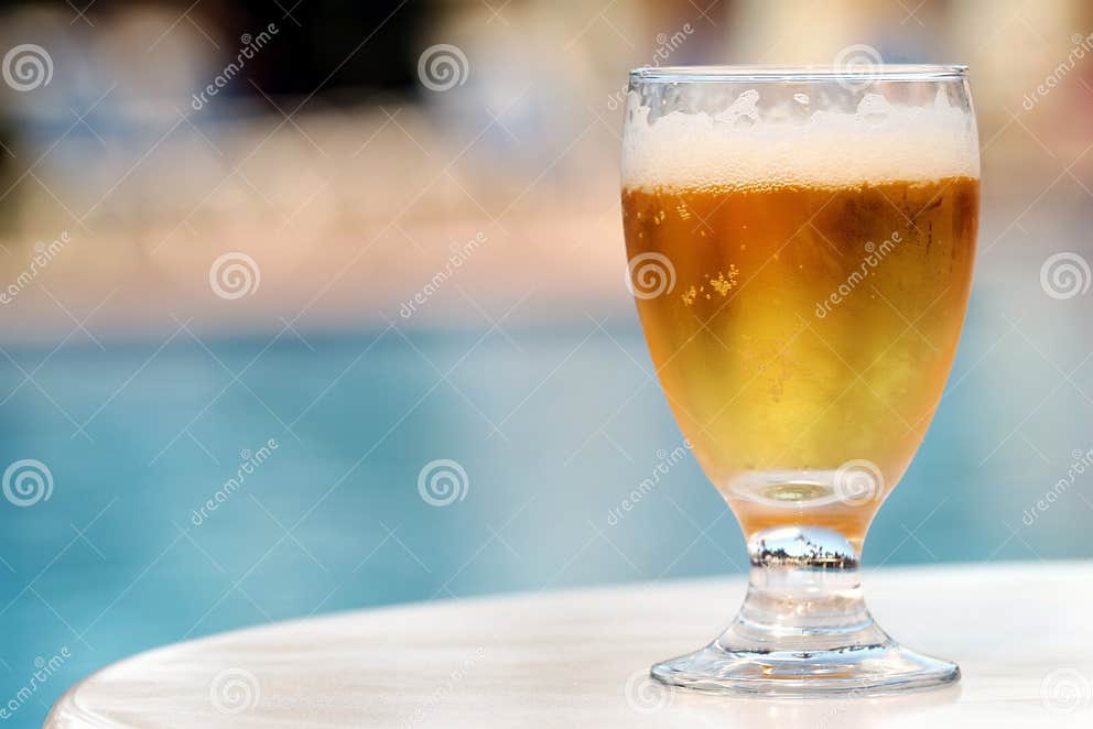 Beer by the pool stock image. Image of drops, beer, holiday - 8700927