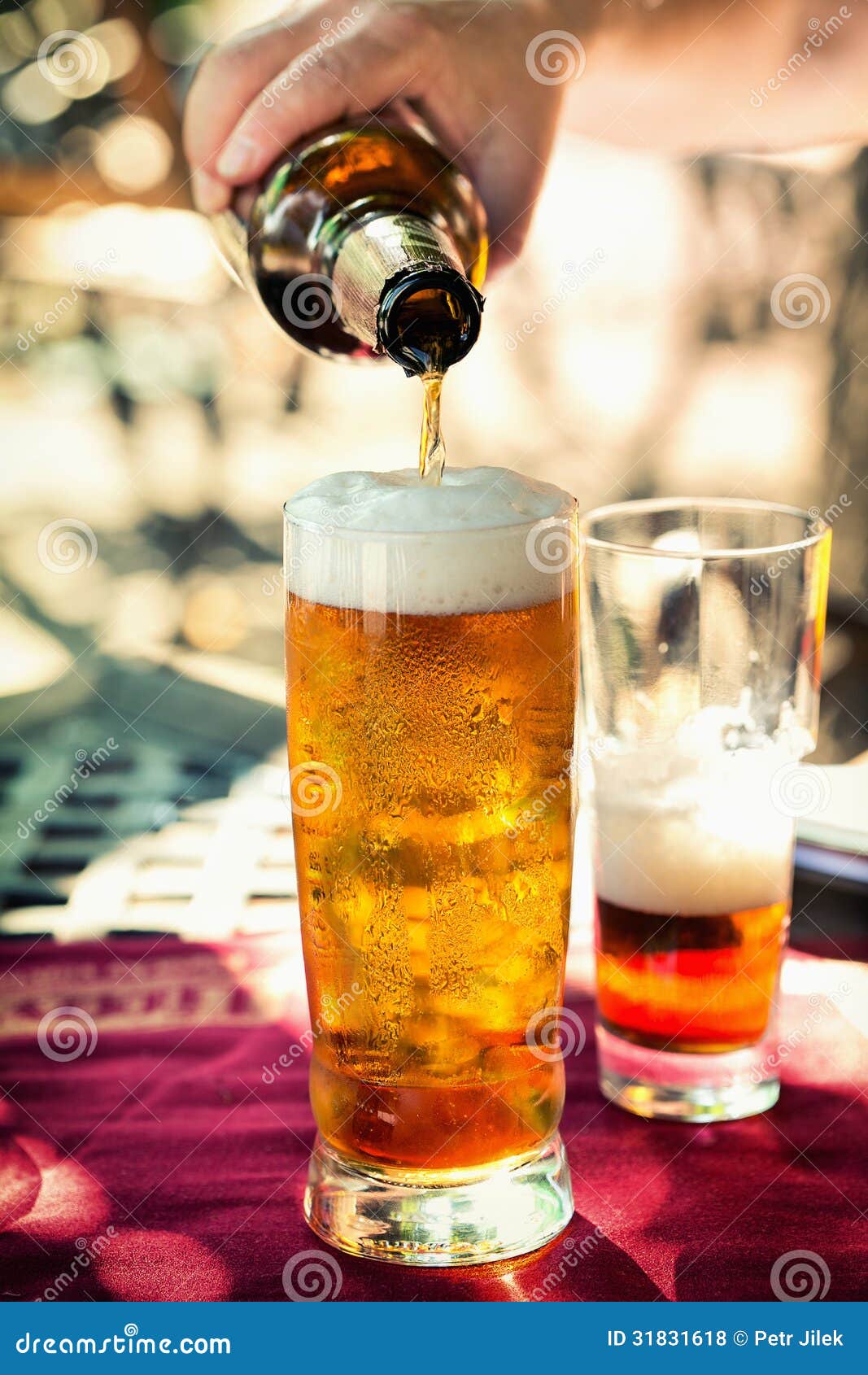 Beer pouring into glass stock photo. Image of brown, light - 31831618