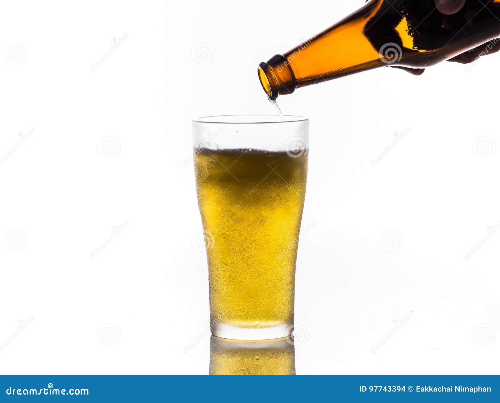 Beer pouring into mug stock photo. Image of lager, falling - 97743394