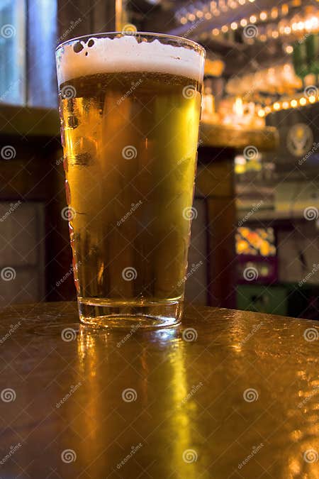 Beer in a Pub stock image. Image of cold, bubbles, tavern - 5114565