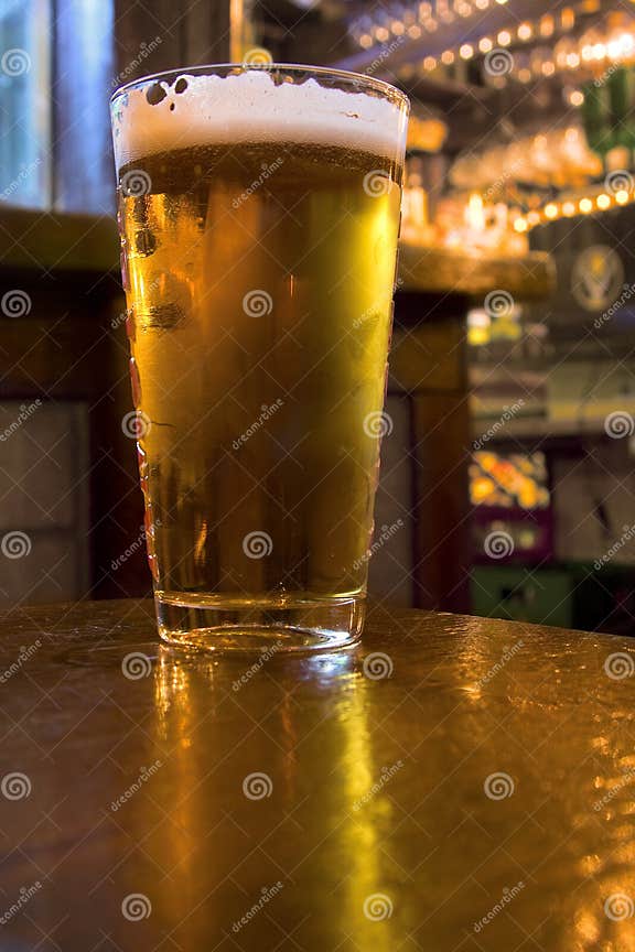 Beer in a Pub stock image. Image of cold, bubbles, tavern - 5114565