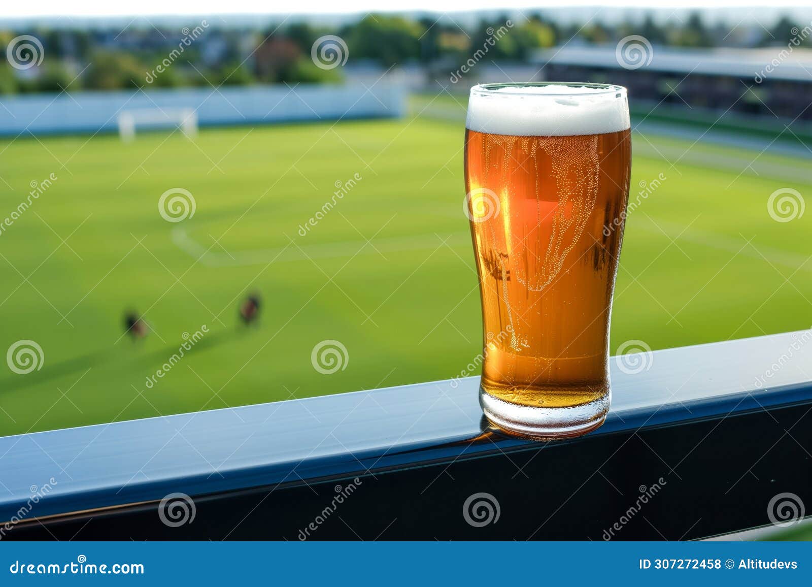 Beer on Railing, Soccer Field in Distance Stock Photo - Image of ...