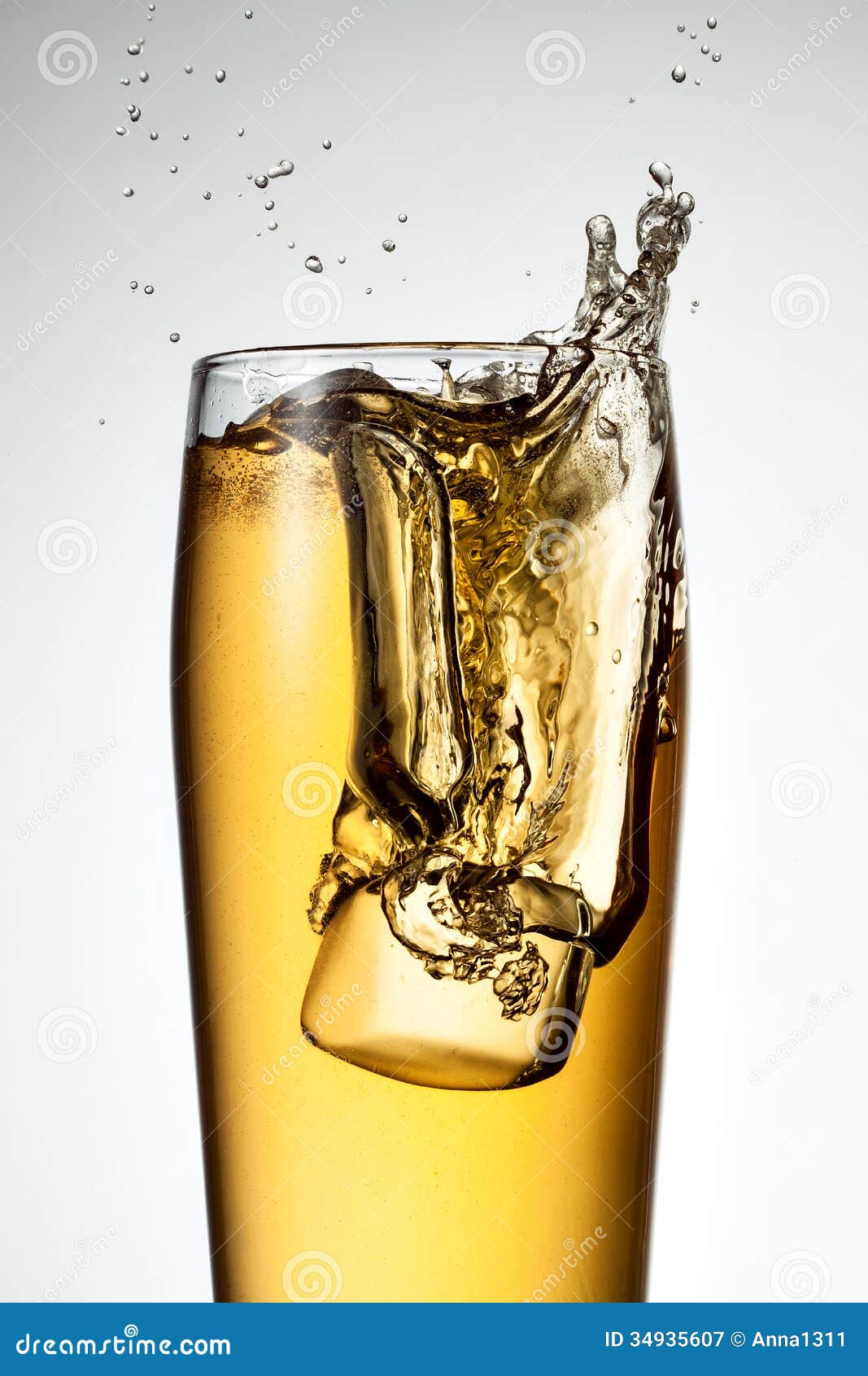 Beer splash with ice stock image. Image of spill, cold - 34935607