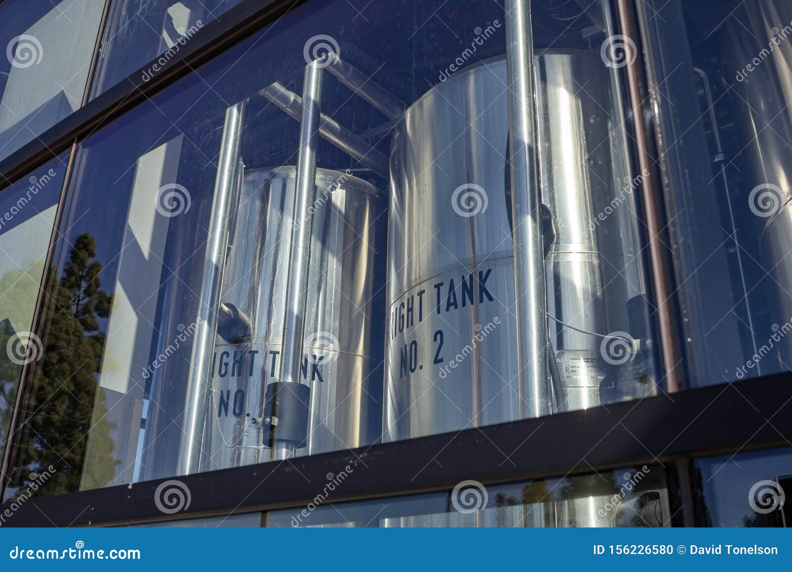 Beer tanks at a brewery editorial image. Image of alcohol - 156226580
