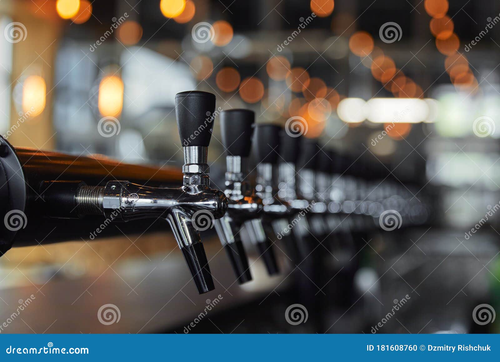 Beer Taps in the Beer Bar in Perspective Stock Photo - Image of handle ...