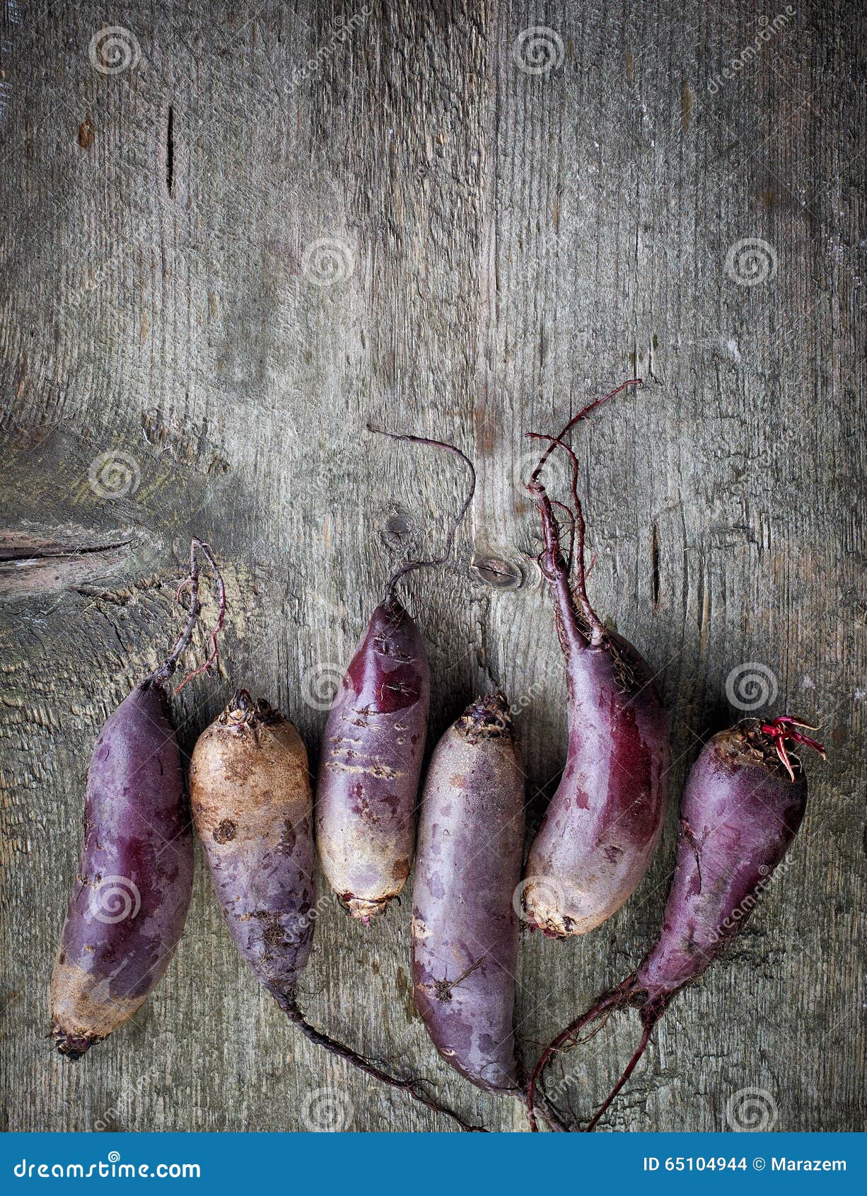 Beet roots on wooden table stock photo. Image of farmer - 65104944