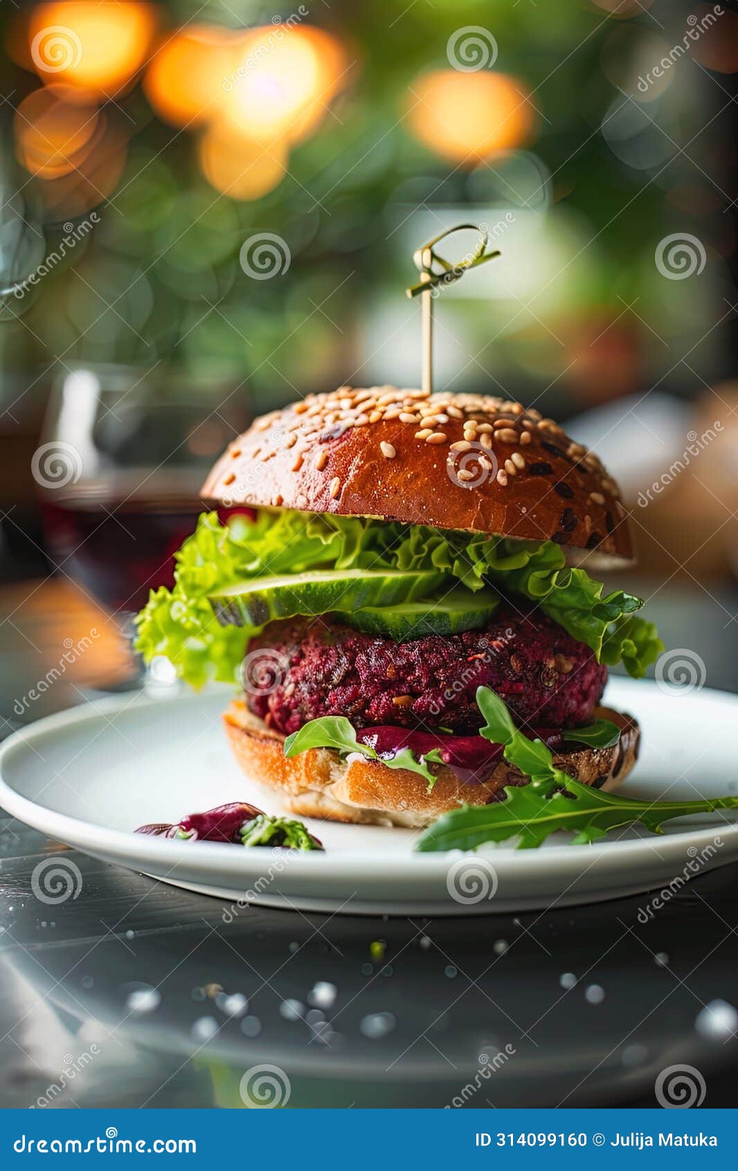 Beetroot Burger with Lettuce and Cucumber on a White Plate, Front View ...