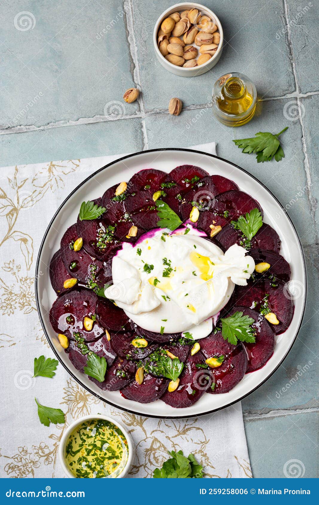 Beetroot Carpaccio with Mozzarella Burrata and Pistachios Stock Photo ...
