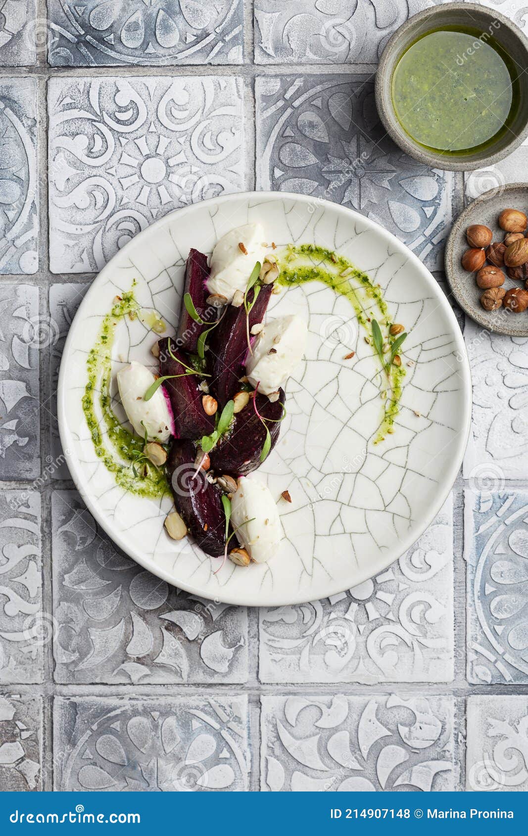 Beetroot and Cream Cheese Salad with Nuts and Pesto Sauce Stock Photo ...