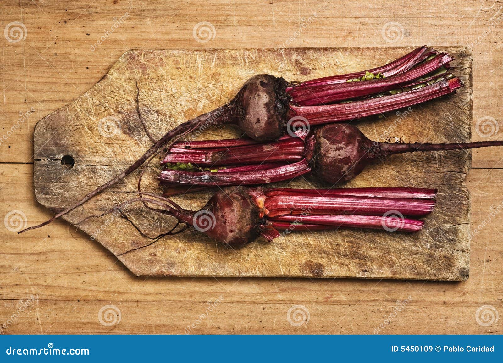 Beets on wooden table. stock image. Image of food, bunch - 5450109