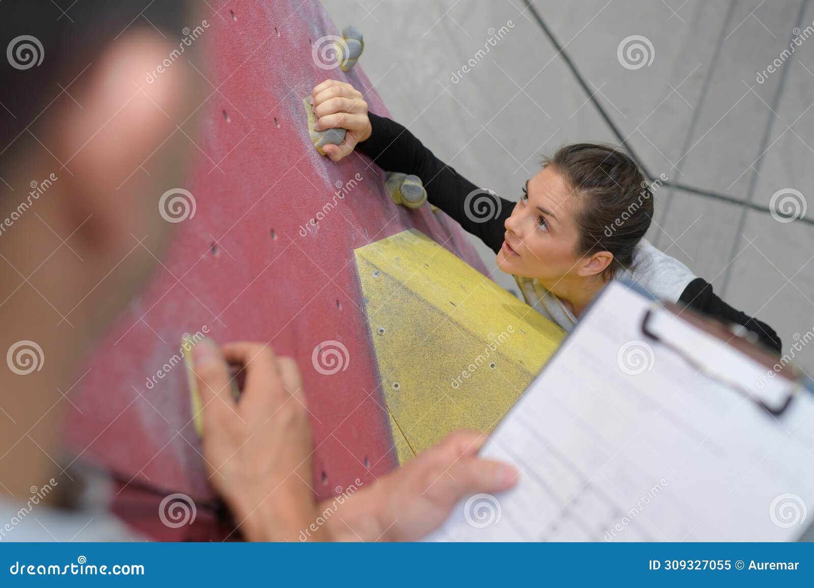 Beginner Female Climber on Boulder Climbing Wall Stock Image - Image of ...